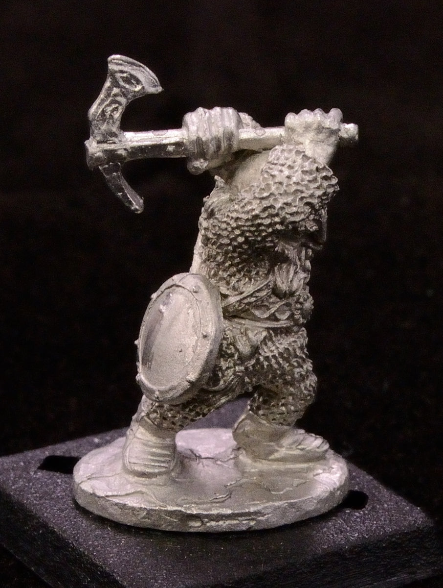 50-0131: Dwarf Miner Swinging Mattock Overhead – Ral Partha Legacy